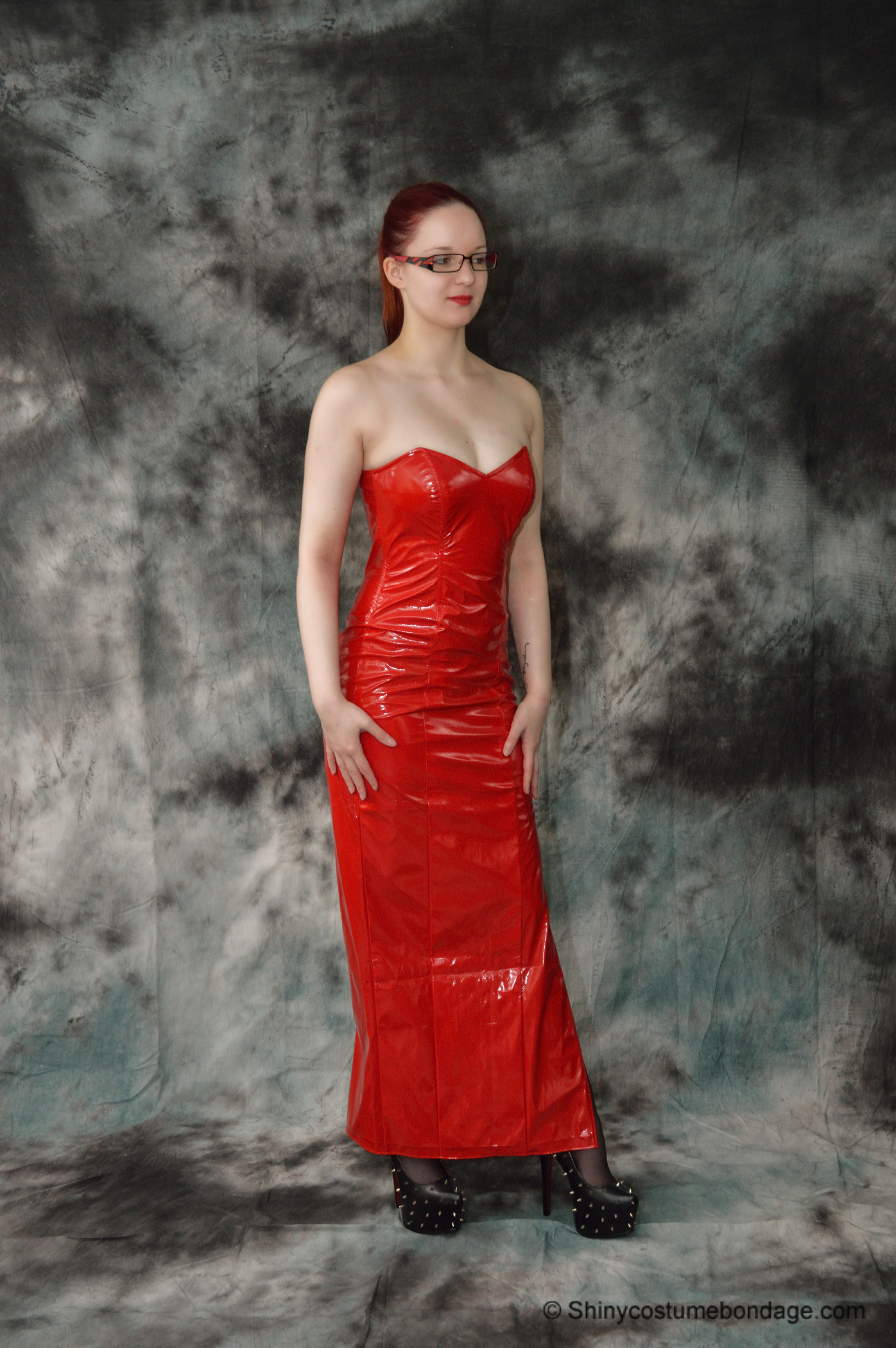 Clipspool | Bound in red PVC dress